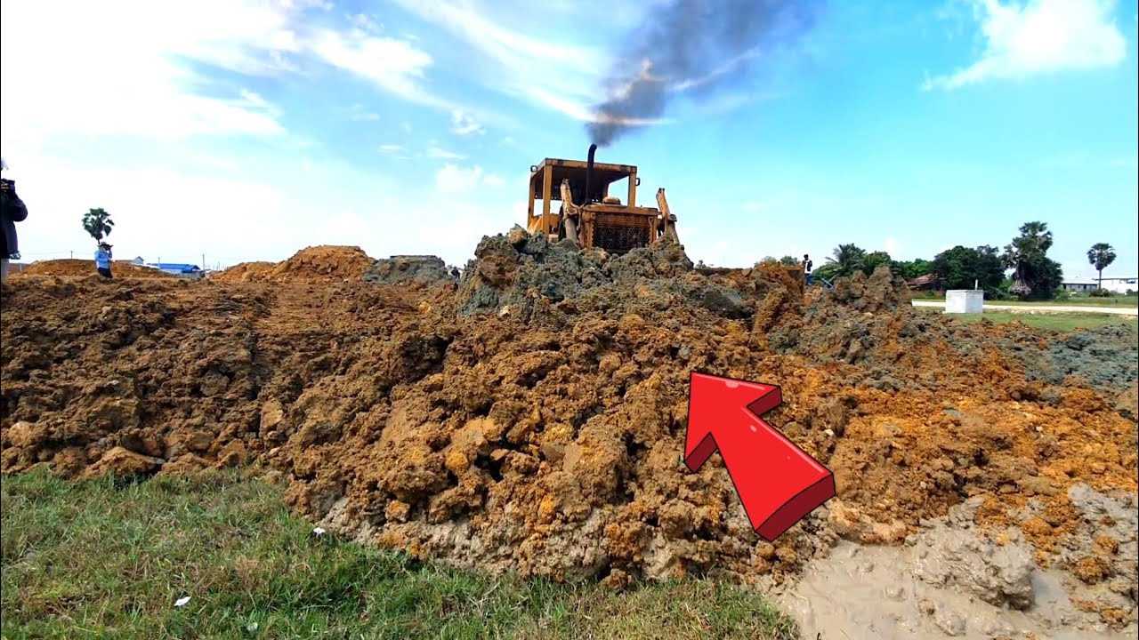 Great heavy old bulldozer Komatsu D53-P use power push Dirt and mud ...