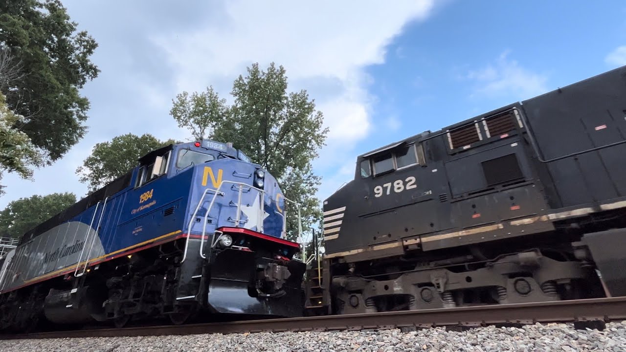 NS 28N Meets Amtrak 74 In Kannapolis - YouTube