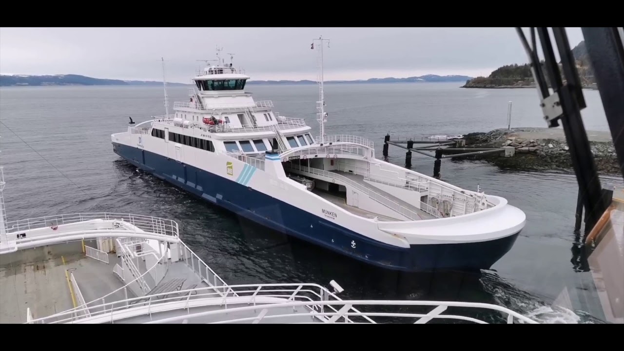 Plug-in hybrid car- and passenger ferry Munken departs Flakk - YouTube
