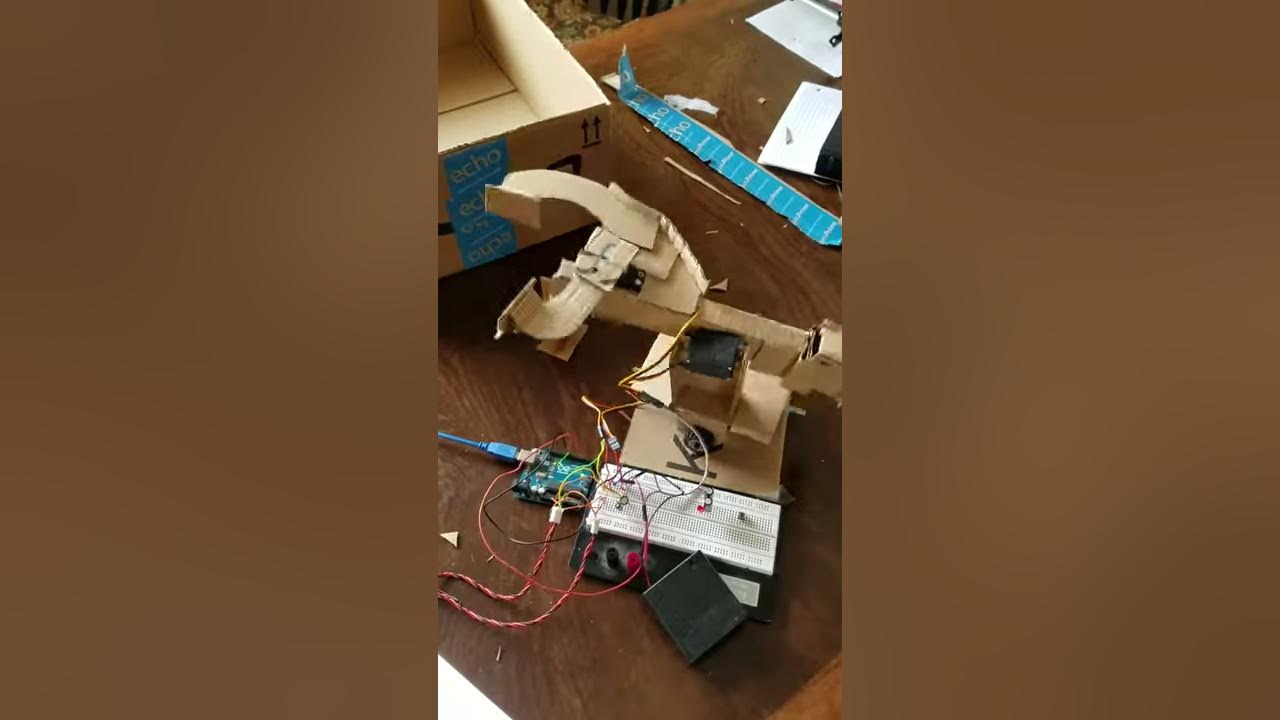 Arduino powered cardboard arm - YouTube