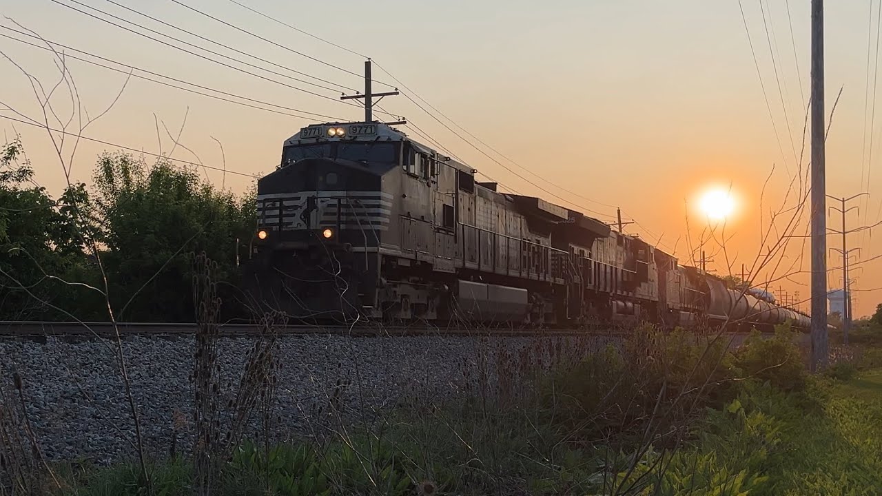 NS 9771 leads CN U706 through Glendale Heights, IL on national train day - YouTube