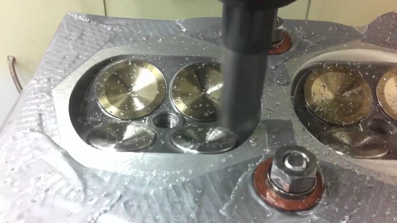 Rottler F68A CNC Machining Subaru Heads - YouTube