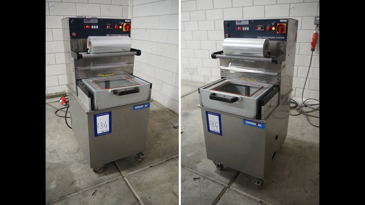 1206-134: Henkovac / HFE Vacuum Systems bv traysealer - YouTube