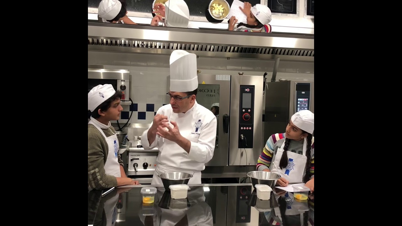 Zeke and Zene have fun with Chef Fabrice Danniel in the Le Cordon Bleu ...