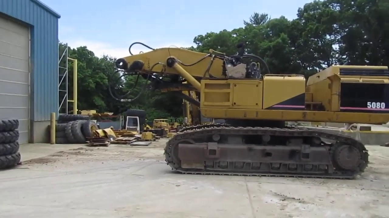 Cat 5080 loading out Mass. to OK. - YouTube