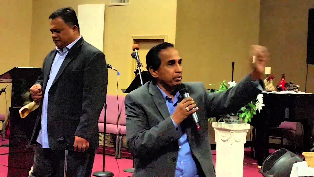 Dr. Augie David prayers for the congregation - YouTube