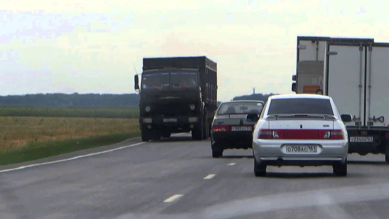 Dodging oncoming traffic on a rural Russian highway - YouTube