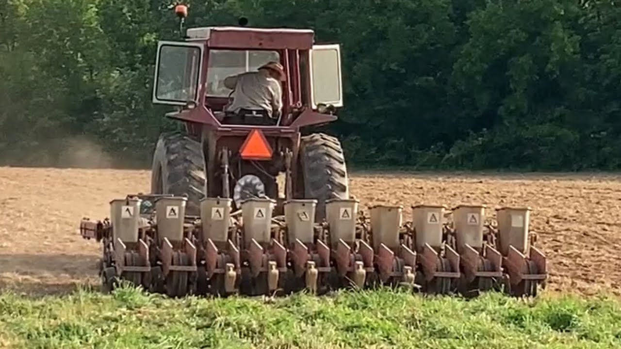 Neighbors Planting beat with their Allis Chalmer bean planter - YouTube