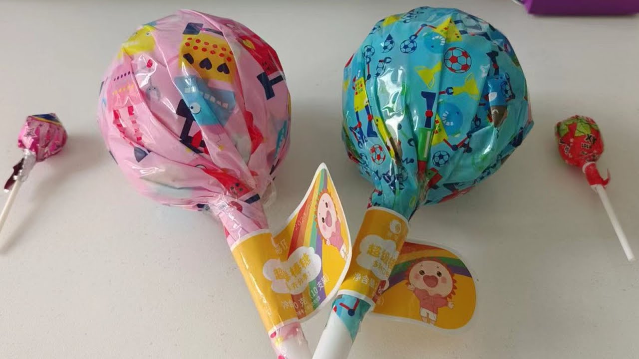 giant lollipop wrapping equipment - YouTube