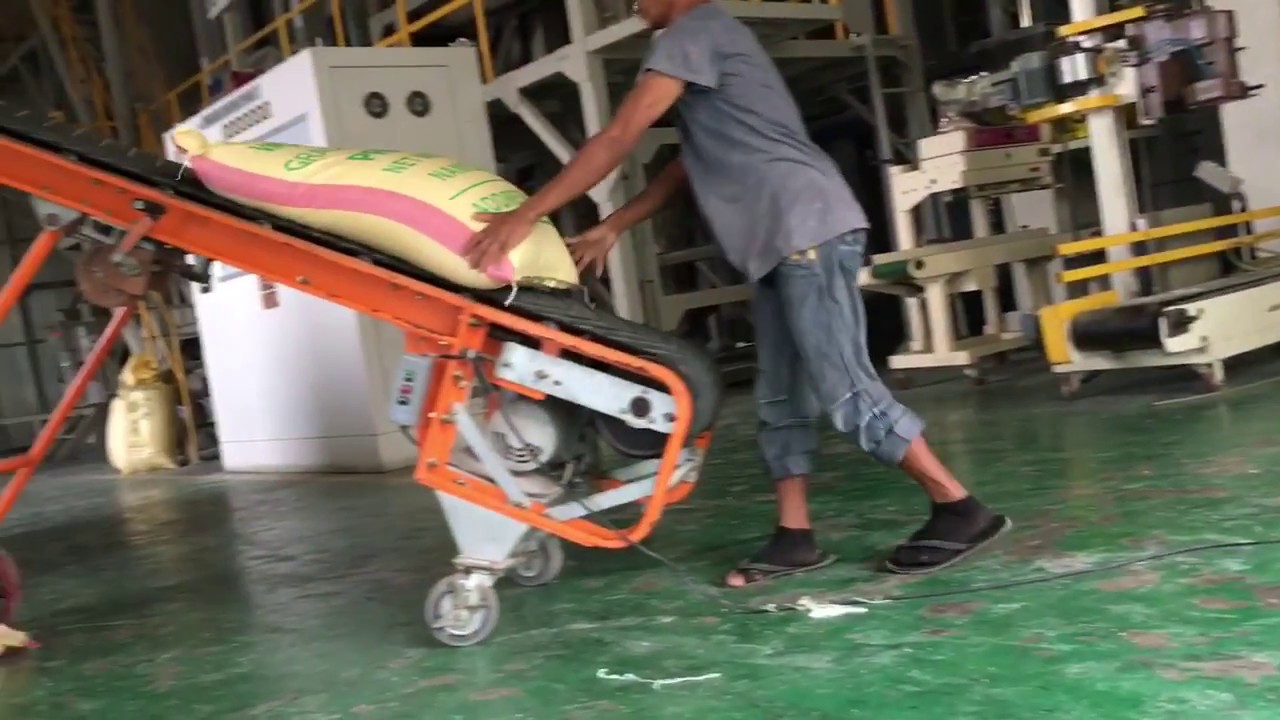 Rice milling at Iloilo Rice Processing Complex - YouTube