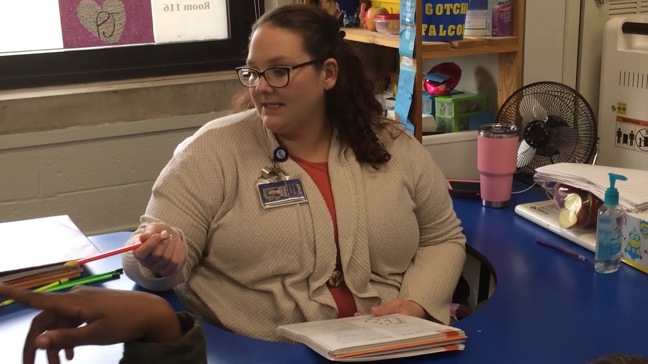 Fairview Elementary paraprofessional Jessica Parnell goes over vowel ...