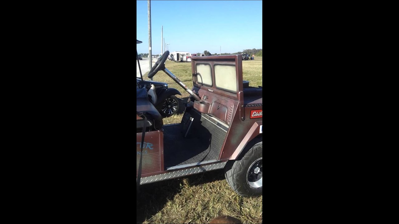 Johnny showing off the Tow Mater golf cart - YouTube