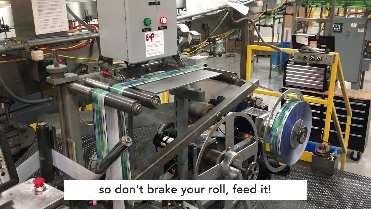 Powered Unwind Tension System on Trine 6500 Roll-Fed Labeler - YouTube