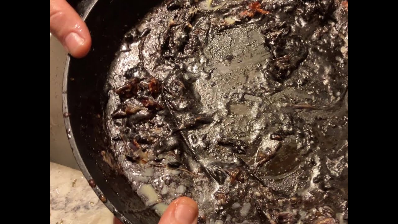 Washing a REALLY Dirty Cast Iron Pan - YouTube