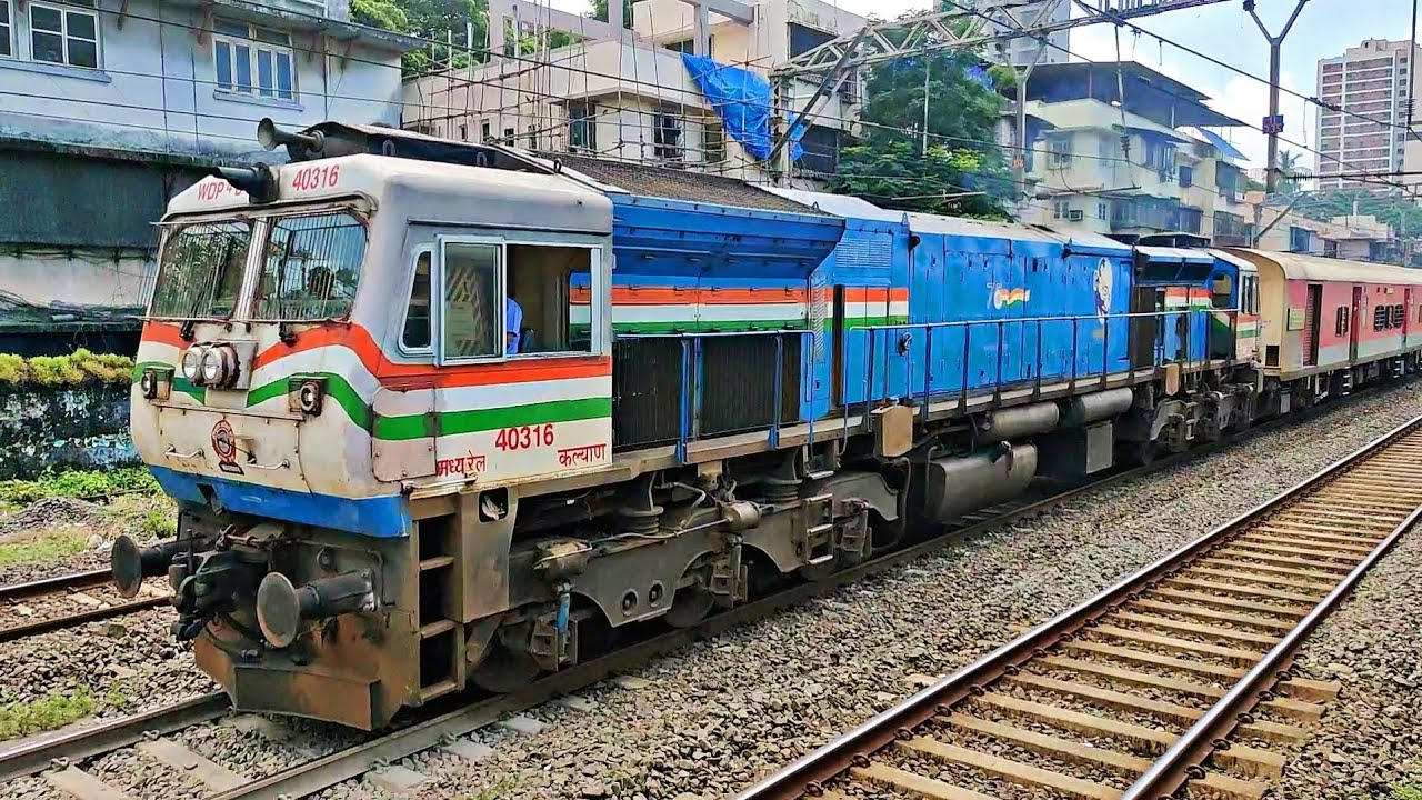 PARALLEL OVERTAKE BY TRICOLOUR EMD KYN WDP4D WITH 11011 MUMBAI CSMT ...