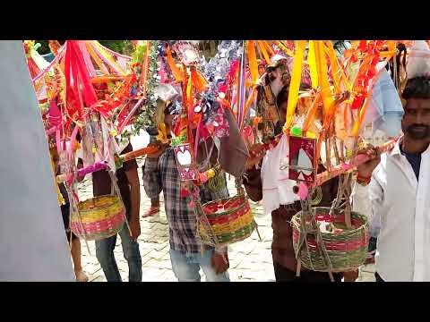 cavad chadate huye,apne ganv ke mandir par