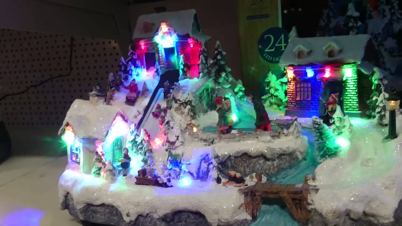 LIGHT UP MUSICAL SNOW SCENE SLIDE AND ICE RINK SCENE - YouTube