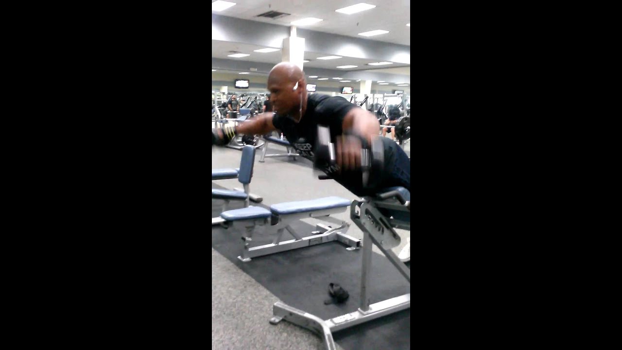 Dumbbell front raises on the lower back extension. - YouTube
