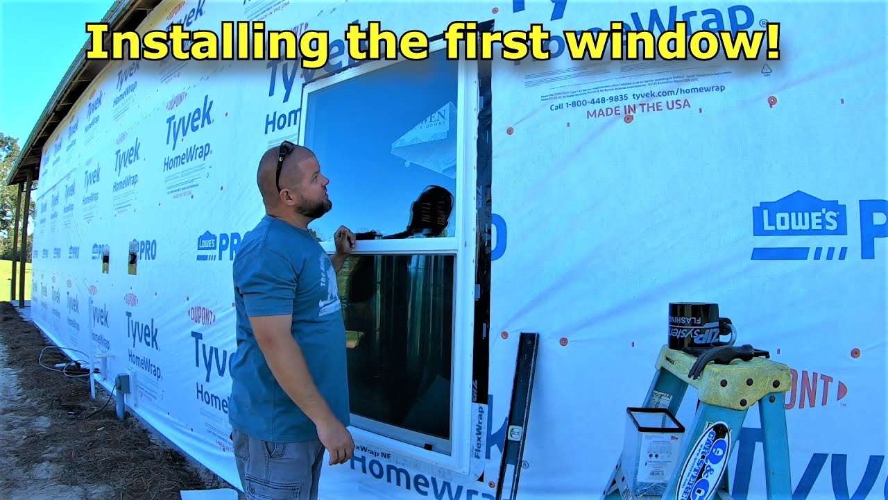 Installing our first window and starting siding! #454 - YouTube