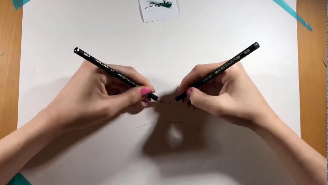 Synchronized Double Handed Drawings - YouTube