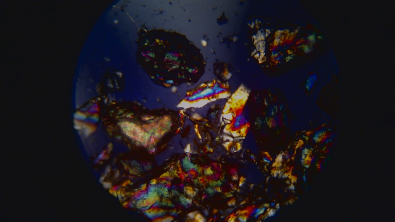 Crushed Quartz under Cross Polarized Light - YouTube