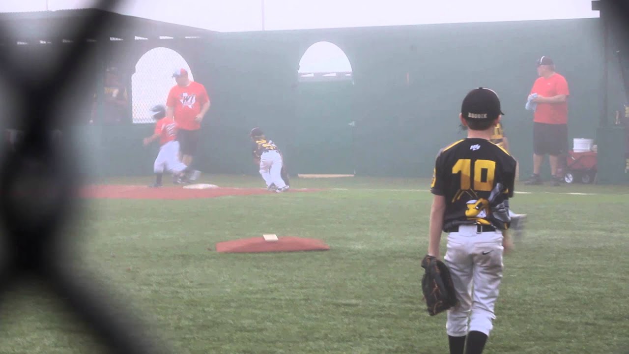 Nolan sliding on wet turf. - YouTube