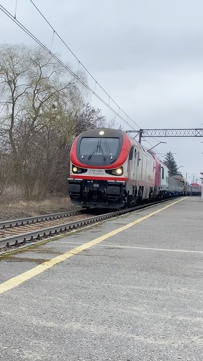 Gama Rail STM Dragon Rail STM z mieszanym składem i na popych EU07-233 Rail STM przejazd przez ...