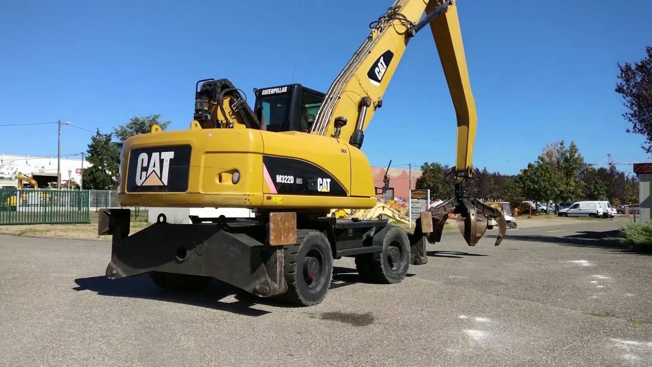 Caterpillar M322D MH - pelle sur pneus - wheel excavator - YouTube