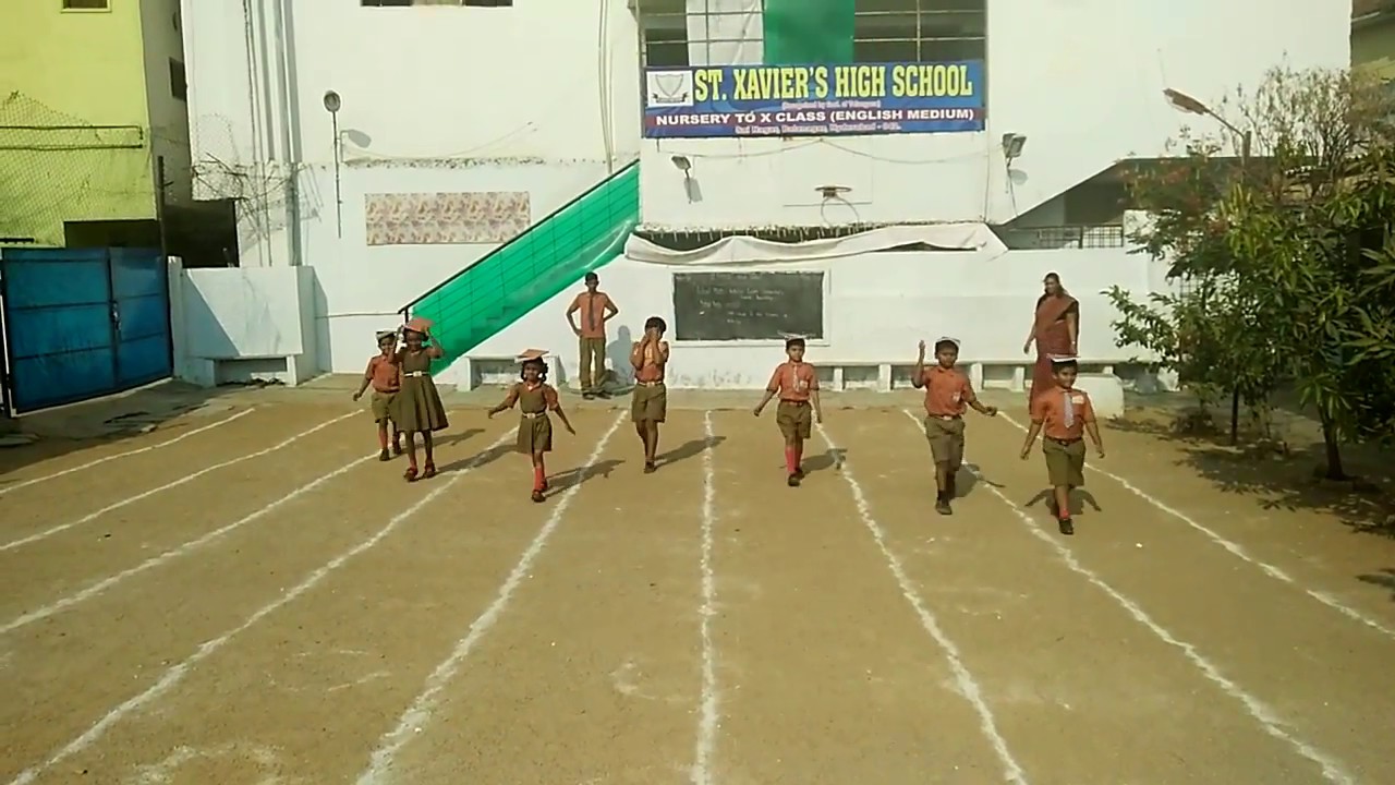 Book balancing game ( 2 class students of xaviers) - YouTube