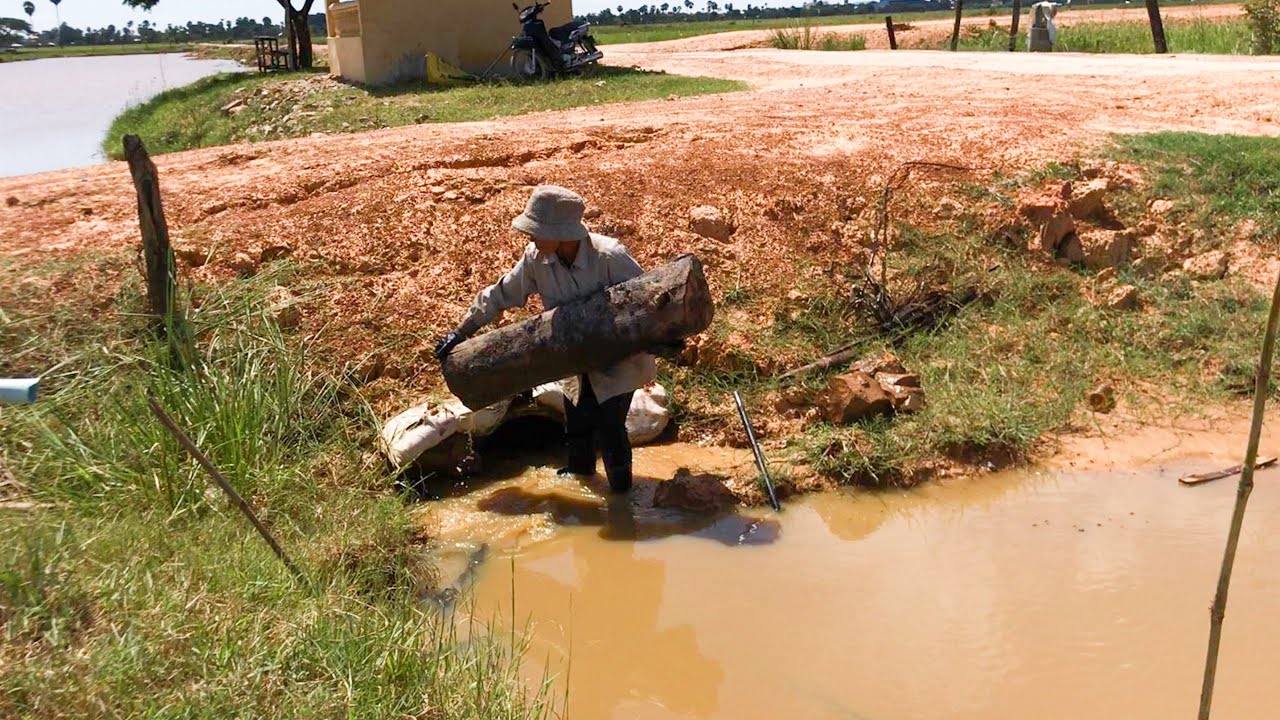 Unclogging Culvert Farm With Rubbish Stuck In Drain Farm - YouTube