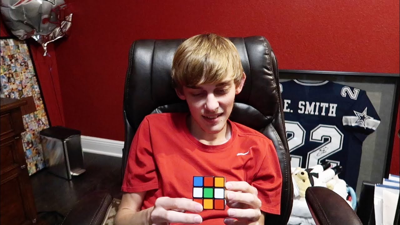 Logan Solves Rubiks Cube in UNDER 1 MINUTE! - YouTube