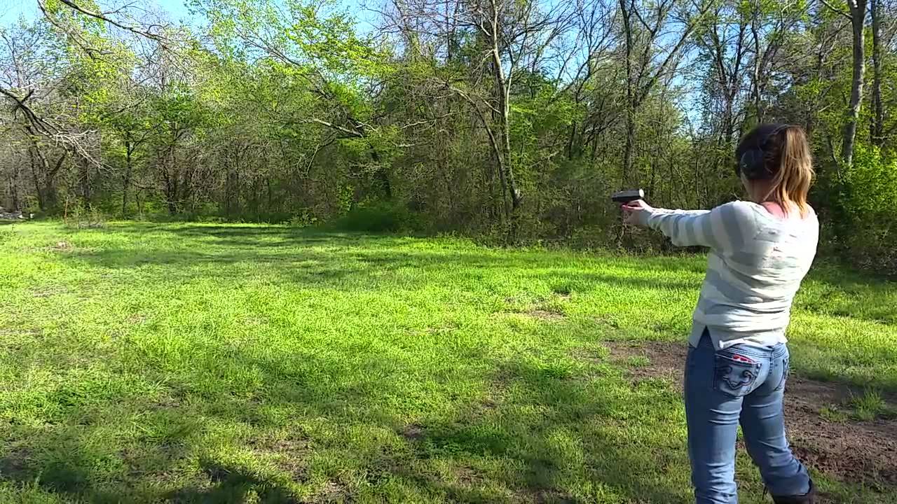 Heather shooting .40 handgun - YouTube