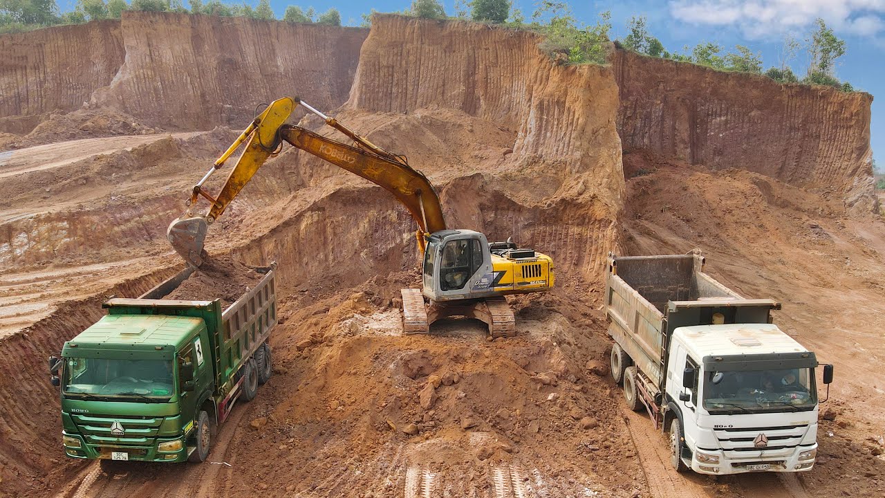 KOBELCO SK250 Excavator Loading Trucks With Two Passes - Excavator ...