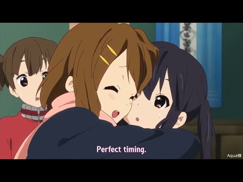 Every time Yui cuddles Azusa's cheeks ( K-ON!! )