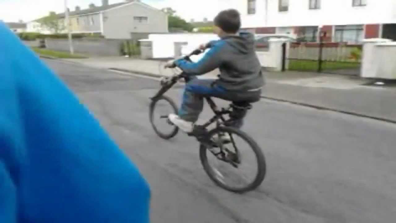 crazy kid wheelies with one wheel - YouTube