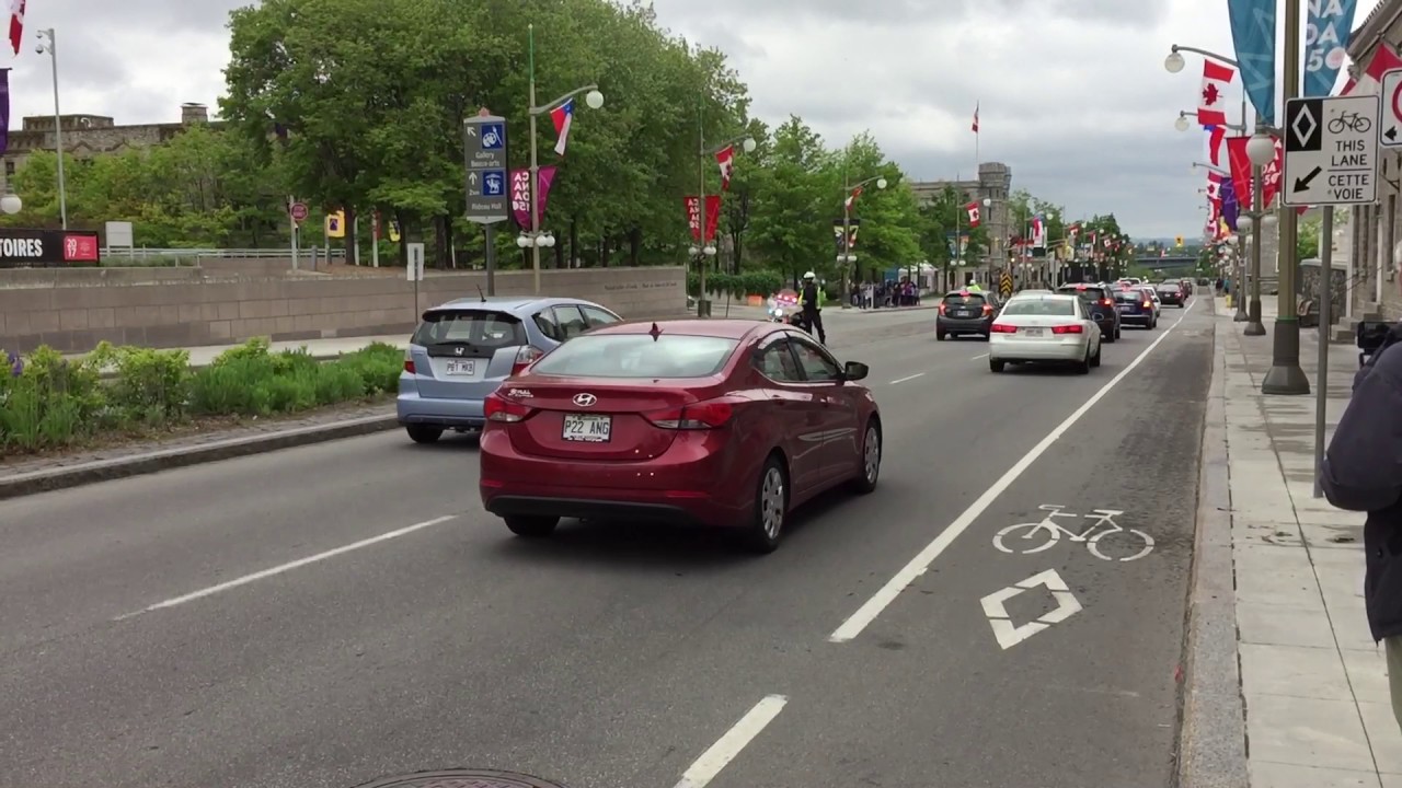 President Michelle Bachelet Waves to Public during Canadian Motorcade ...