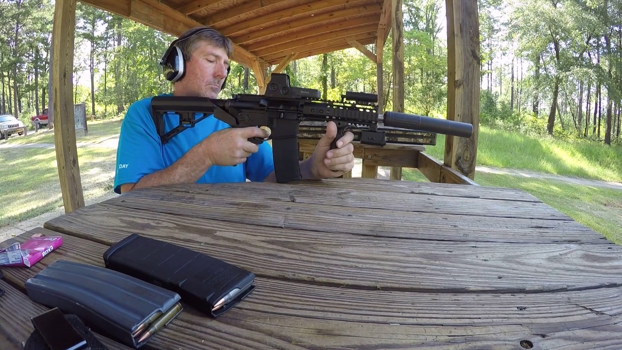 Bump fire stock test fire on suppressed AR - YouTube