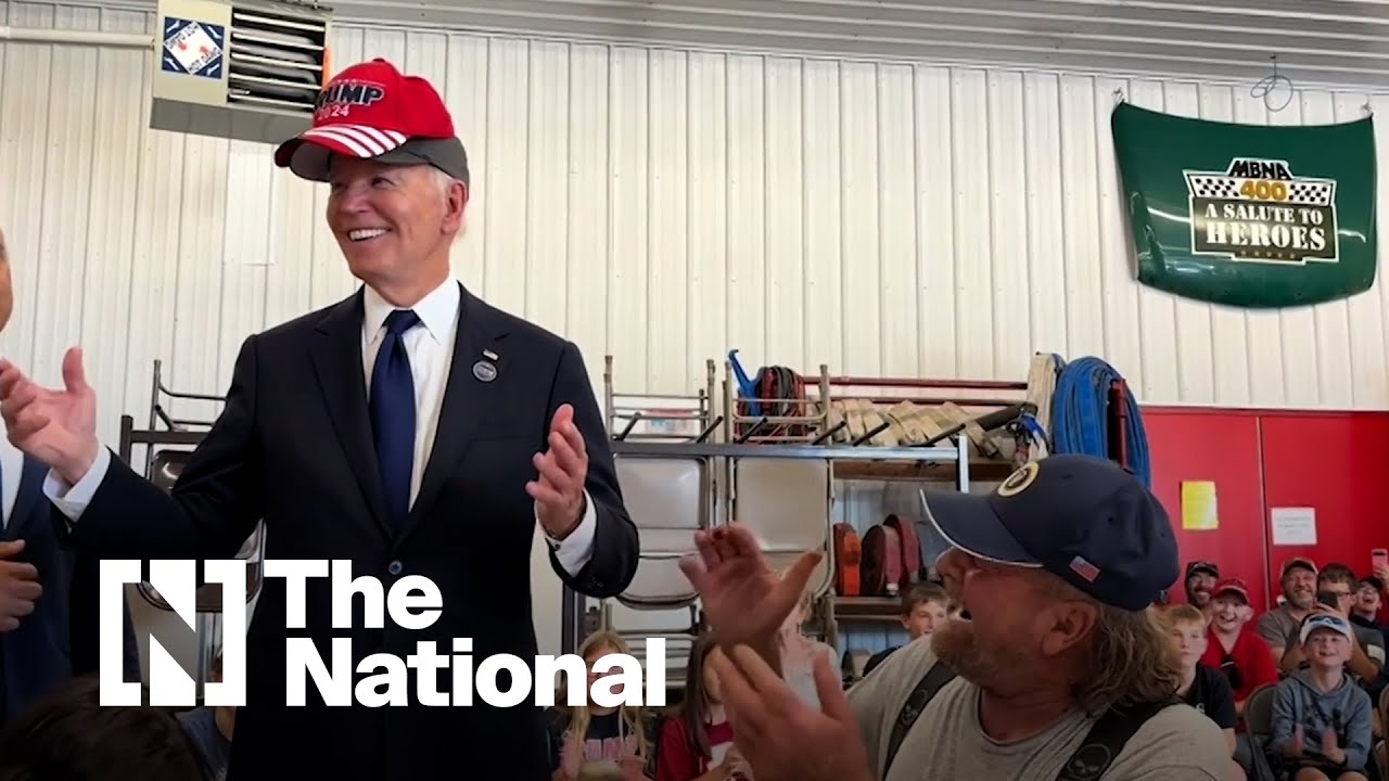 Moment Joe Biden puts on Donald Trump cap in Pennsylvania - YouTube