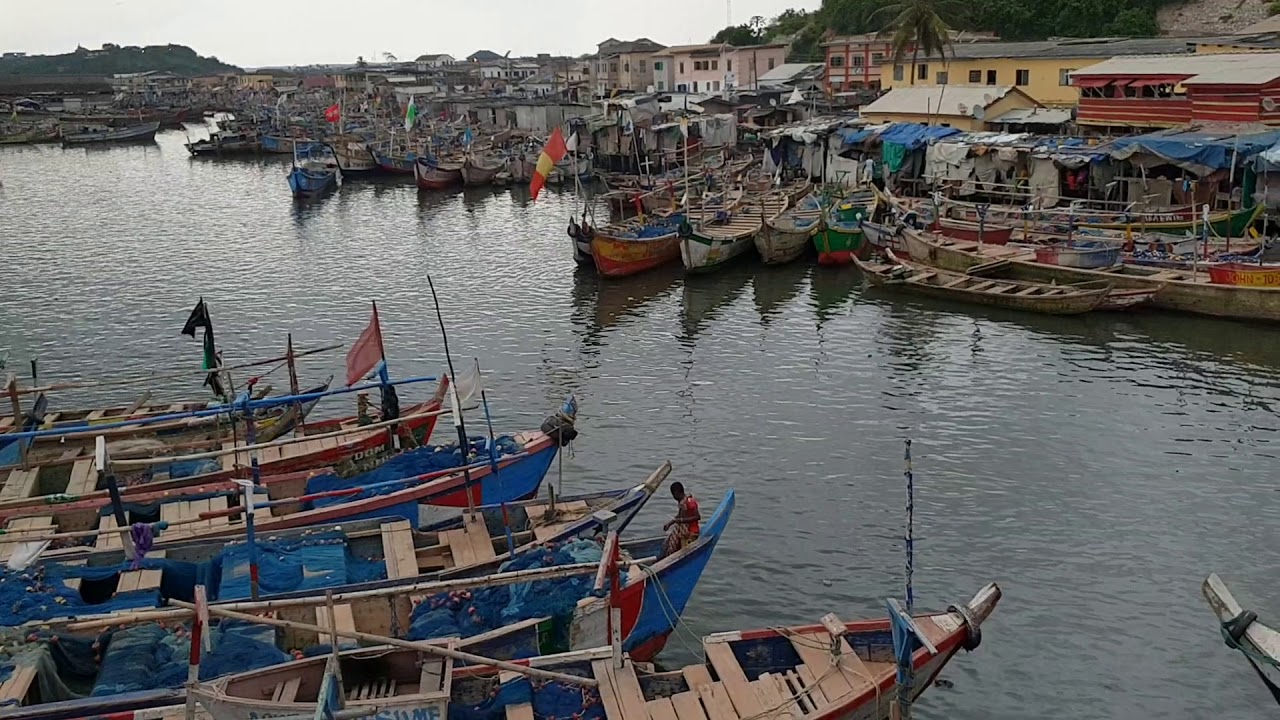 Fishing harbour Elmina - YouTube