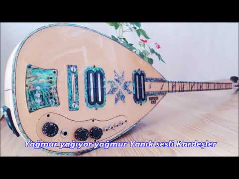 Yağmur yağıyor yağmur Yanık sesli Kardeşler Elektro Bağlama Slaytı