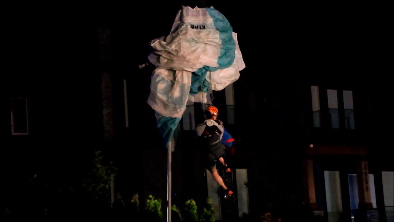 Paraglider Stuck Hanging on Power Lines - YouTube