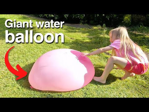 We get SOAKED with a GIANT WATER BALLOON - YouTube