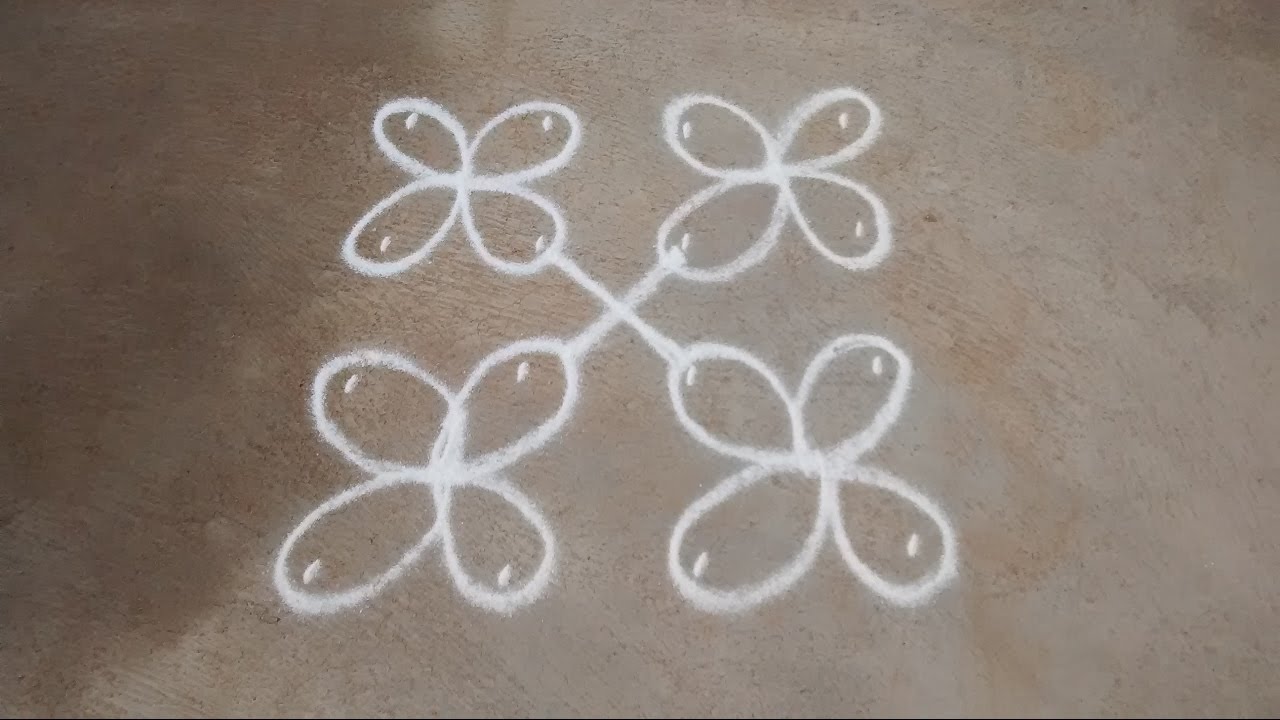 how to put kolam in 50 seconds (simple and easy flower kolam 12) - YouTube