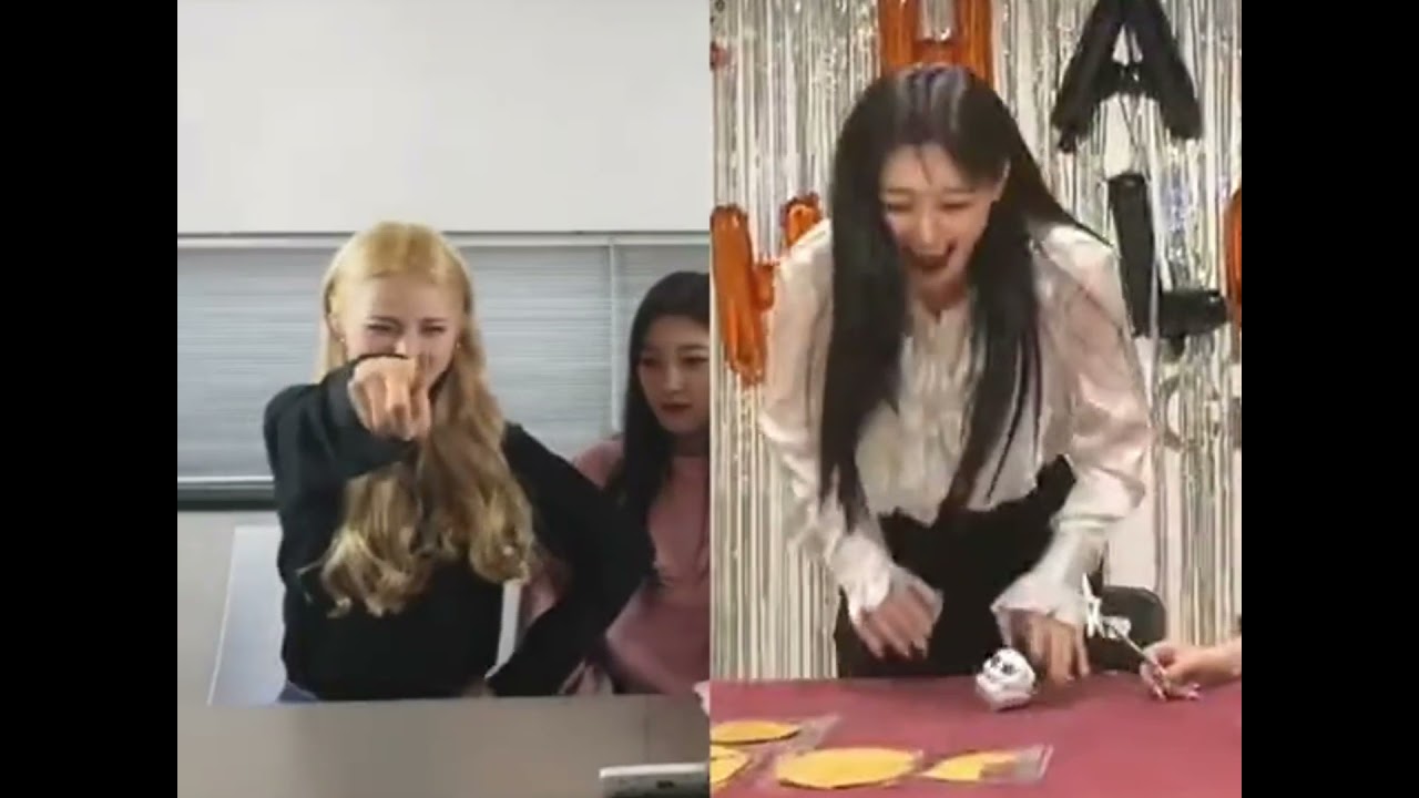 jinsoul and choerry from loona headbanging face slaming diving onto the ...