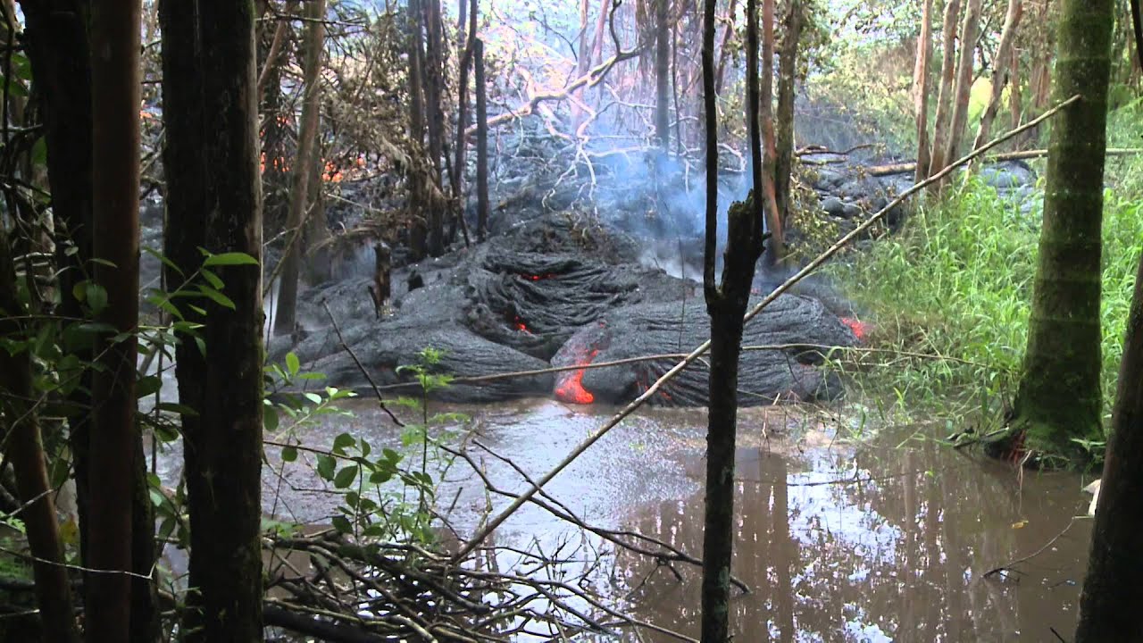 Puna lava flow 2014 11 02 Wide view of lava entering pond - YouTube