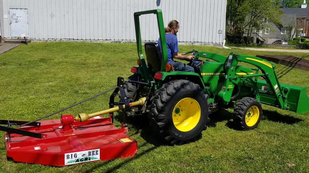 30 HP John Deere 790 demo on 5-foot rotary cutter - YouTube