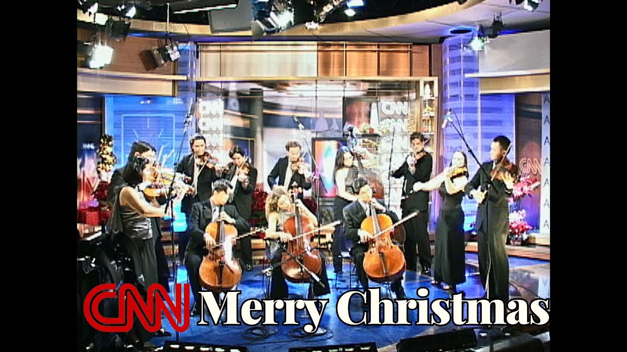 2002 performance of Christmas songs on CNN - YouTube