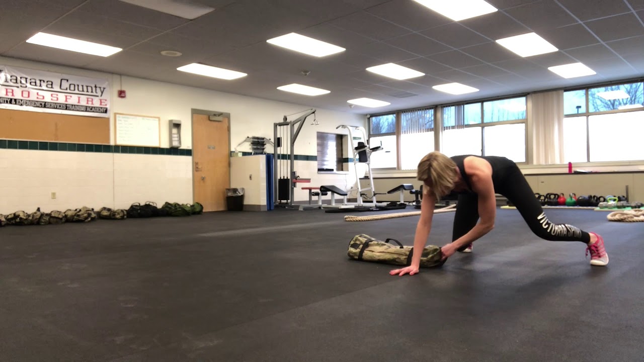Lateral Bear Crawl Sand Bag Drag - YouTube