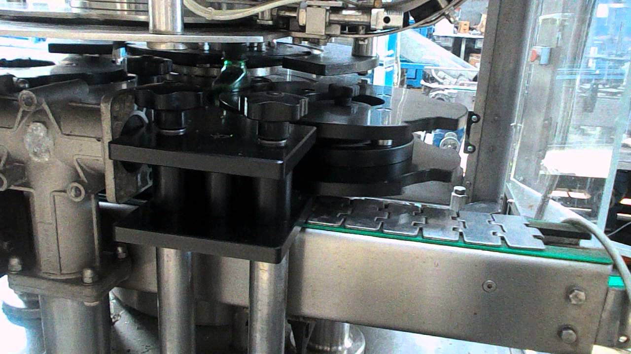 Arol 5-head capper - YouTube