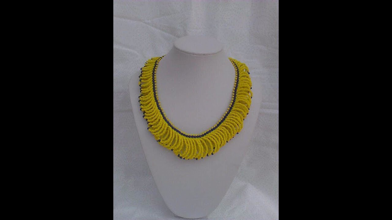 the tutorial on how to make this beautiful yellow and blue bead - YouTube